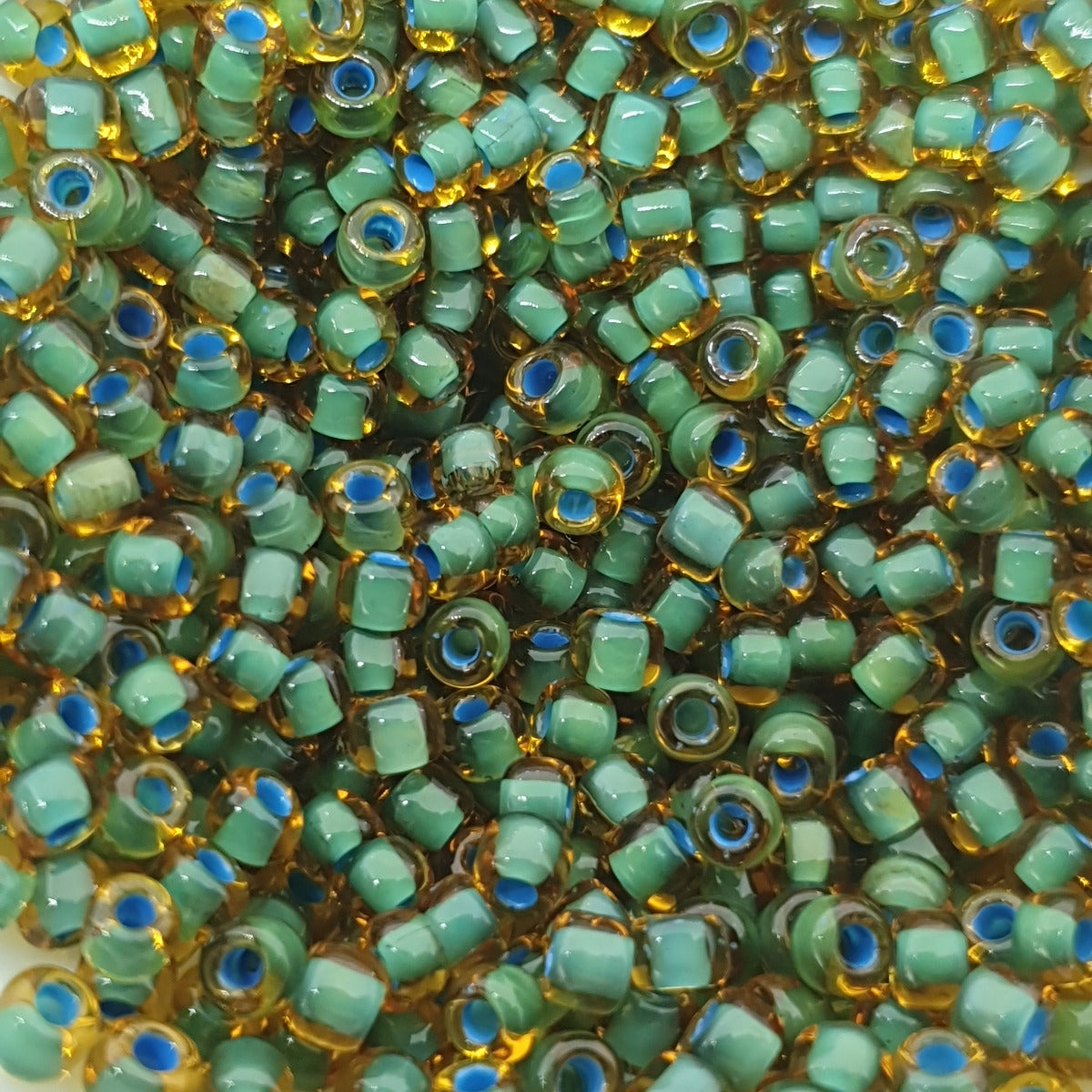 8/0 (#1/216) Blue Lined Transparent Amber - 22g Tube – Bead Shack